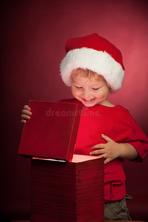 Happy boy open gift-box stock photo. Image of celebration - 101920800