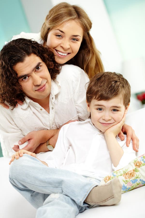 Happy boy and parents stock image. Image of female, lifestyle - 22407413