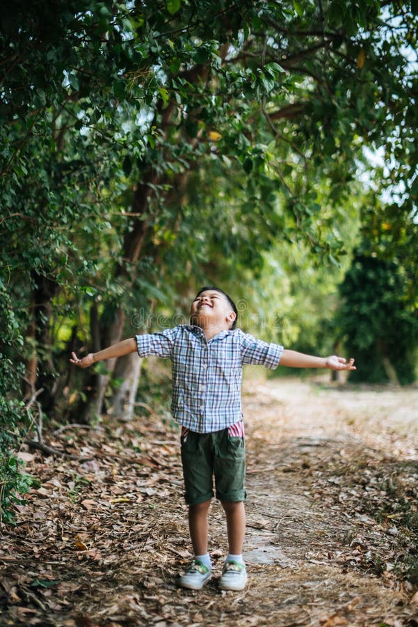 Happy Boy Sitting and Thinking Alone Stock Image - Image of cute ...