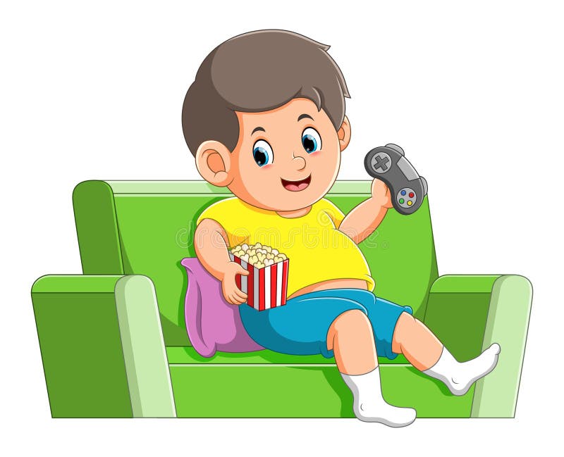 The Happy Boy is Playing the Game and Eating the Popcorn on the Sofa ...
