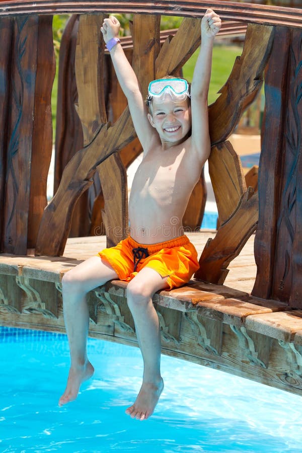 Happy boy by pool stock photo. Image of enjoyment, recreation - 20338512