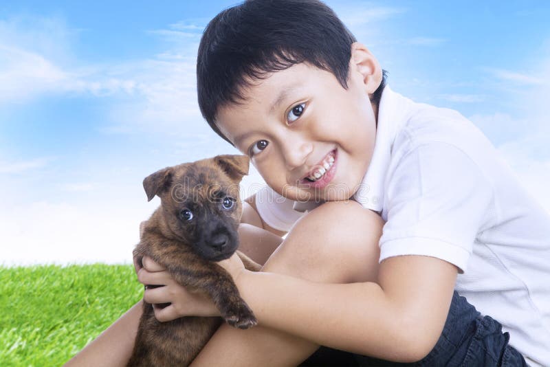 Happy Boy and Puppy Outdoors Stock Photo - Image of animal, love: 28964294