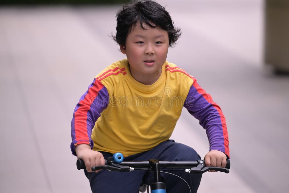 Happy Boy Ride on a Bicycle Stock Photo - Image of race, ride: 277153440