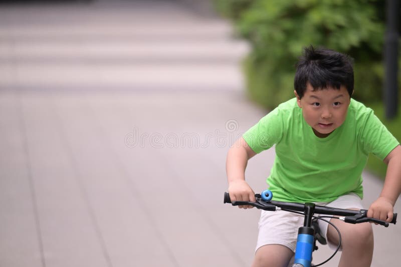 Happy Boy Ride on a Bicycle Stock Image - Image of hair, headband ...