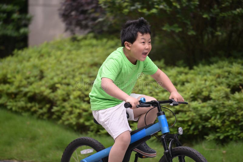 Happy Boy Ride on a Bicycle Stock Photo - Image of race, recreation ...