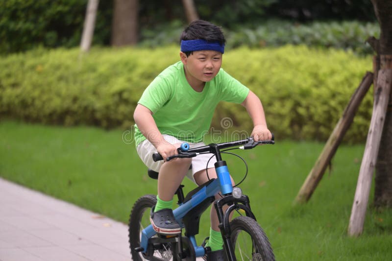 Happy Boy Ride on a Bicycle Stock Photo - Image of bicycle, happy ...