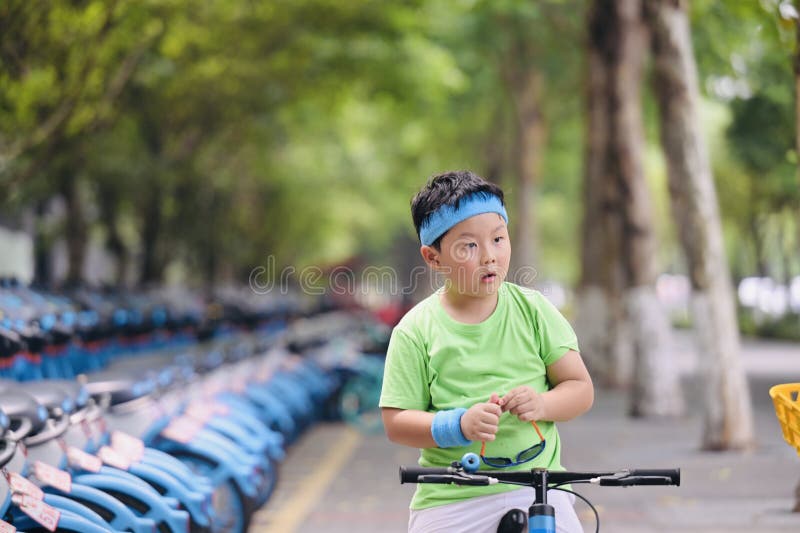 Happy Boy Ride on a Bicycle Stock Image - Image of cool, bicycle: 287786857