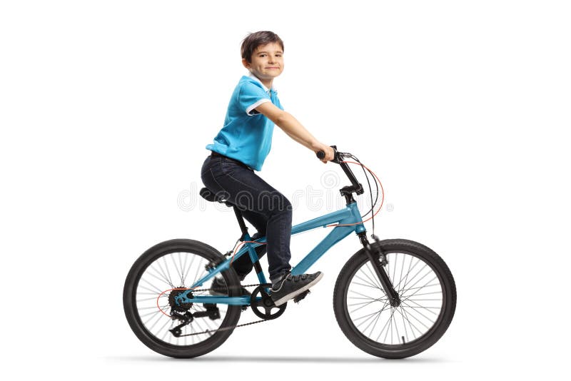 Happy boy riding a bicycle stock photo. Image of isolated - 184248532