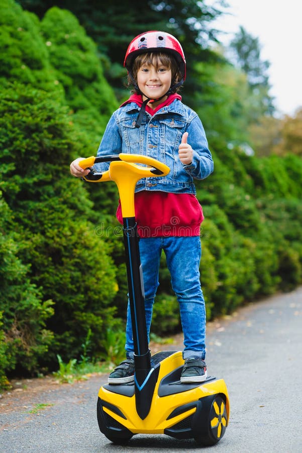 Happy Boy Riding on Hoverboard or Gyroscooter Outdoor Stock Photo ...
