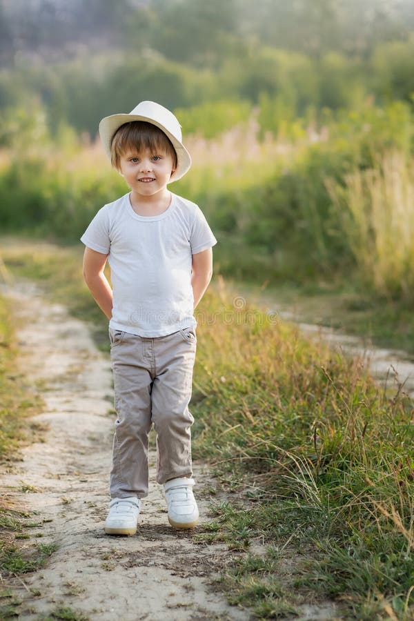 Happy Boy on Road in Meadow in Summer Stock Image - Image of park ...