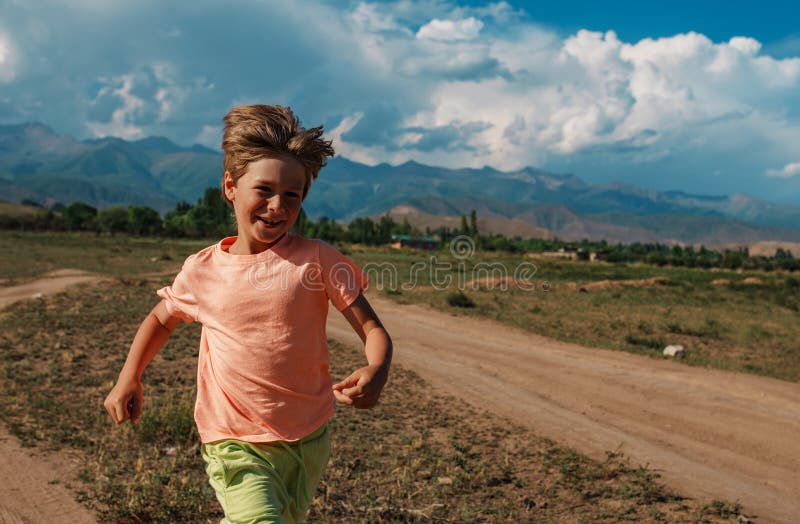 Boy Running Fast on Mountains and Meadow with Farm Animals Background ...