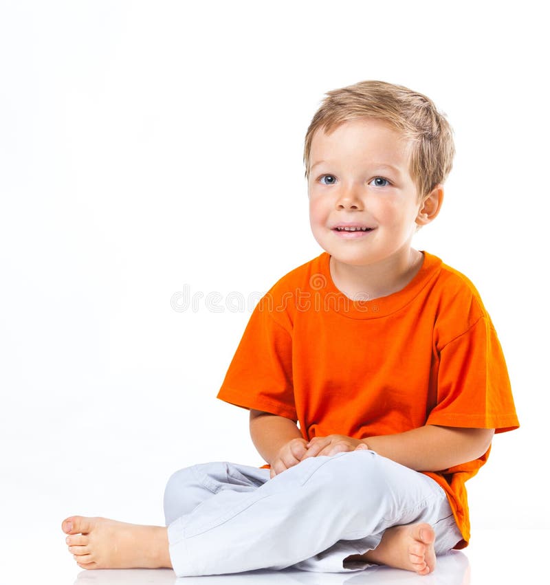Happy Boy Sitting on the Floor Stock Photo - Image of caucasian, face ...