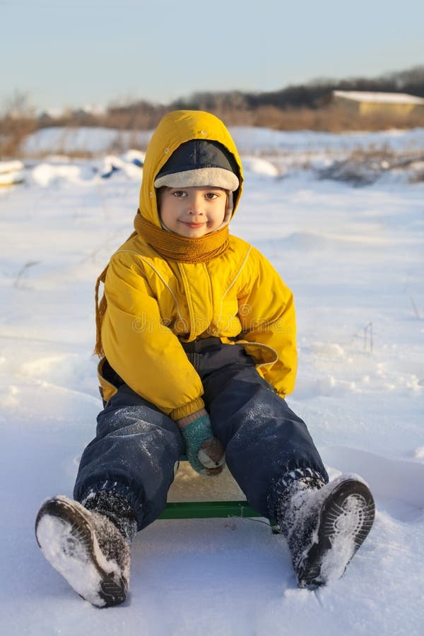 Happy boy on sled stock image. Image of active, eyes - 61071817