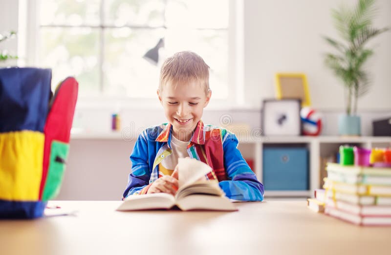 Happy Boy Smiling and Turning Pages. Stock Image - Image of reading ...