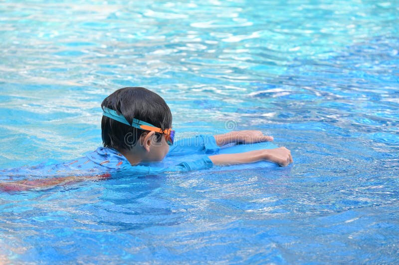 Happy Boy Swimming in the Blue Pool, Sport Leisure Activity Stock Image ...
