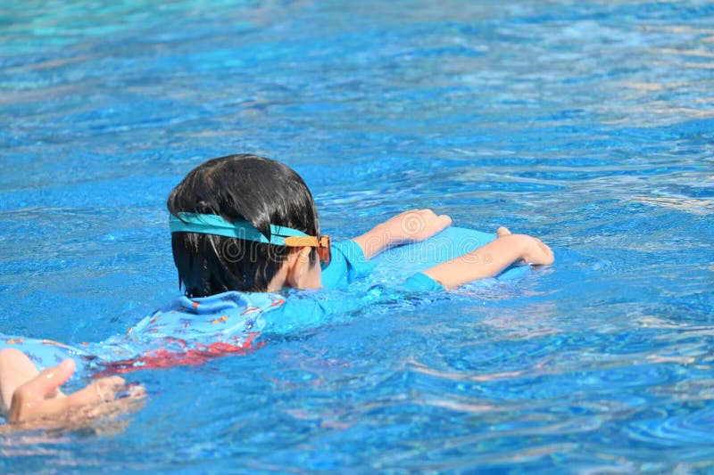 Happy Boy Swimming in the Blue Pool, Sport Leisure Activity Stock Image ...