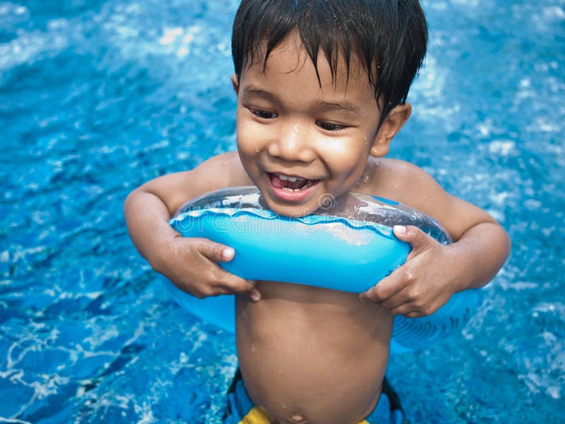 Happy Boy Swimming in the Pool Stock Image - Image of activity ...