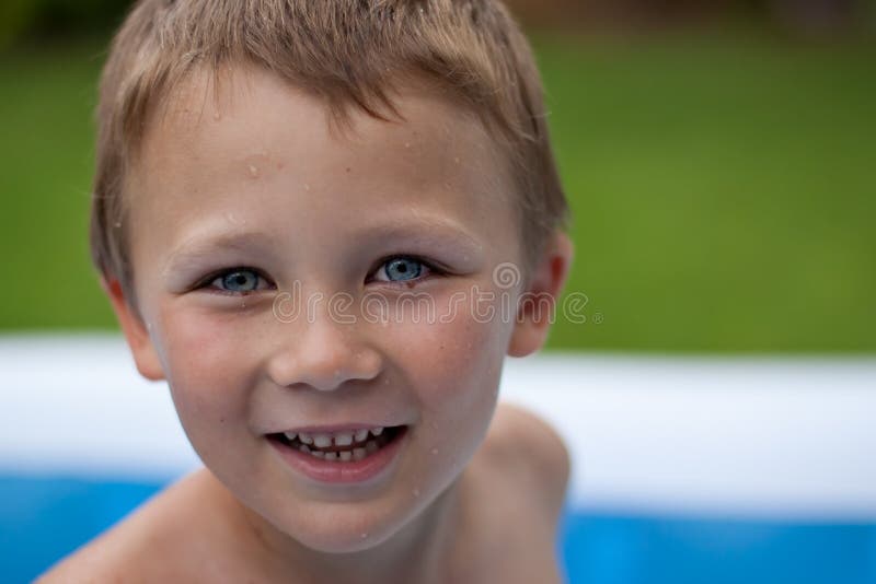Happy Boy in swimming pool stock photo. Image of heat - 26922628