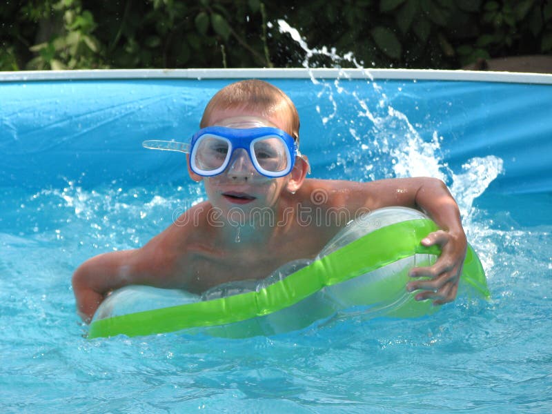 The Happy Boy Swims in the Pool. Stock Photo - Image of portrait, swim ...