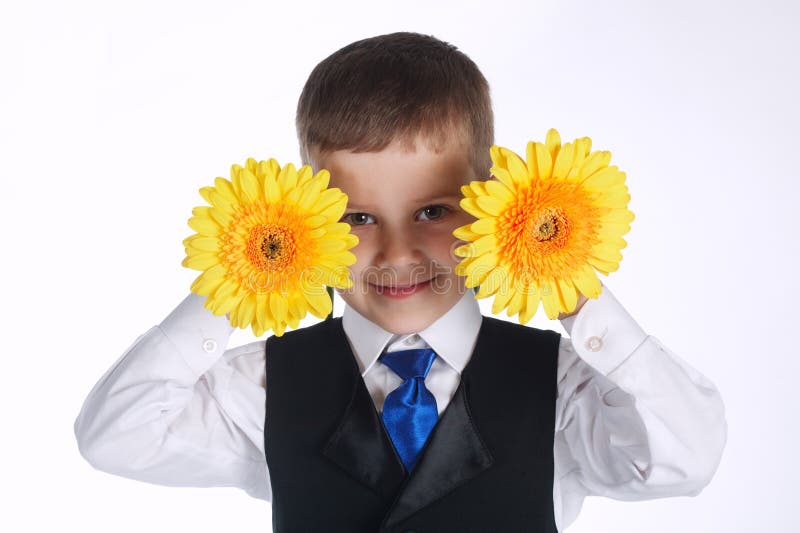 Happy Boy with Yellow Flowers Stock Photo - Image of color, happy: 84742026