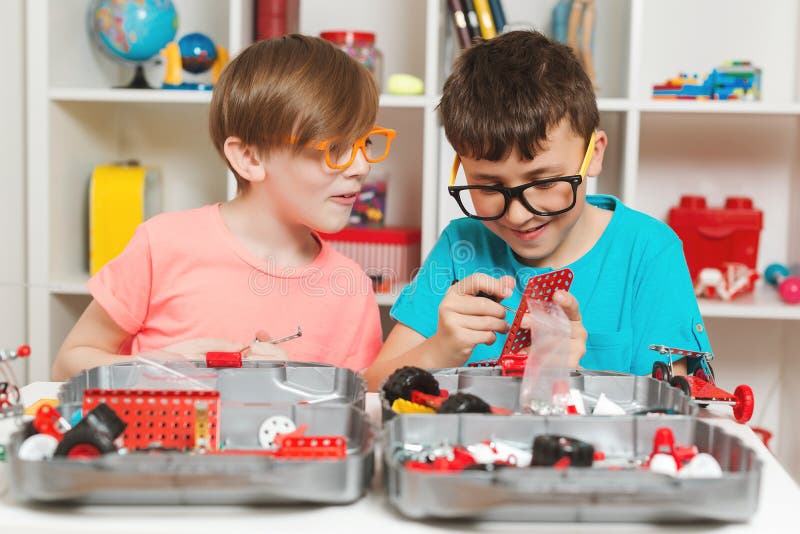 Happy Boys Playing with Metal Constructor. Education, Engineering and ...