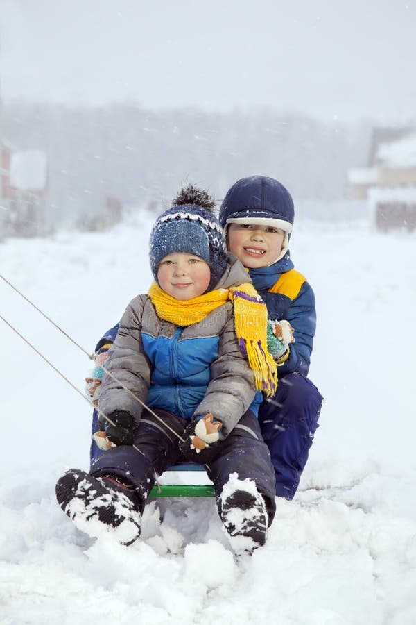 161 Two Happy Boys Sled Stock Photos - Free & Royalty-Free Stock Photos ...