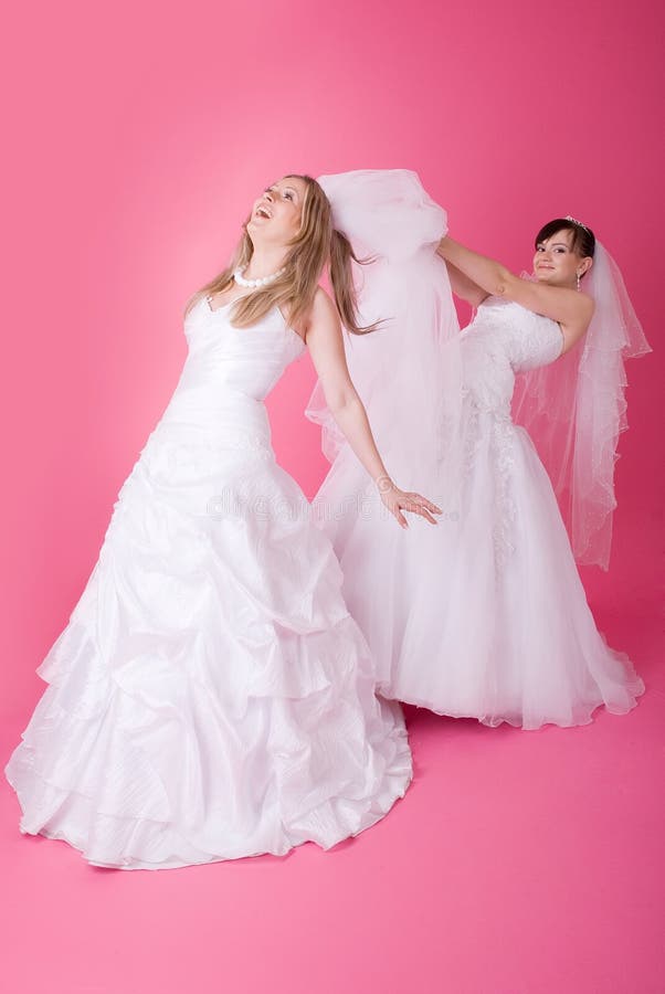 Two brides fight stock image. Image of protection, religion - 13640715