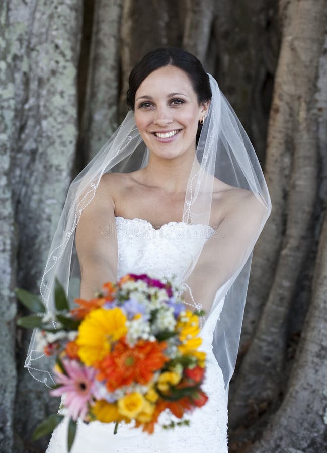 Bride and flower girl stock photo. Image of outdoors - 15238310