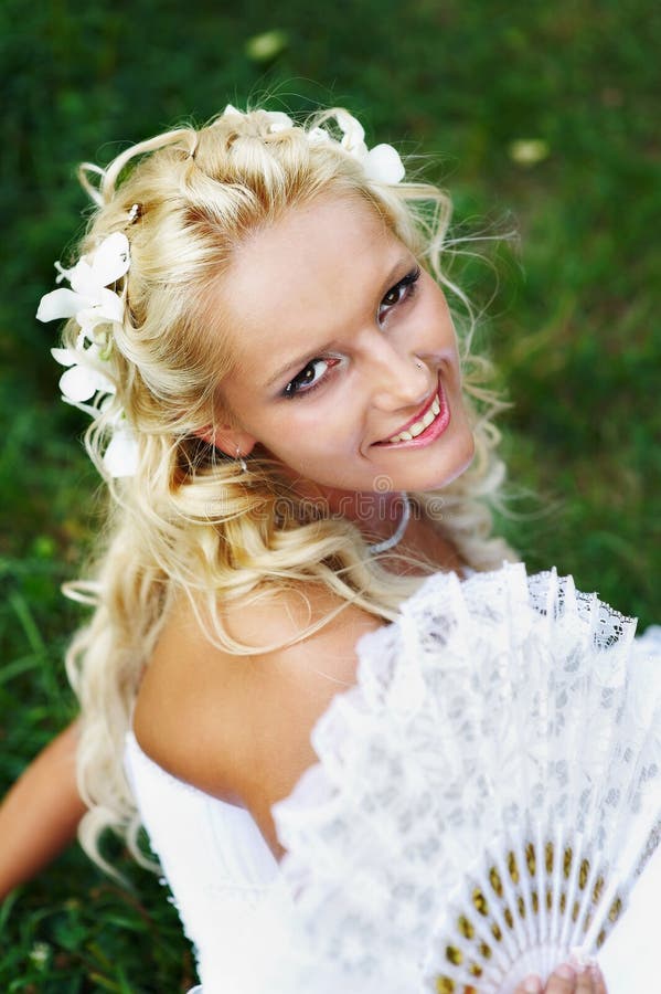 Happy bride with fan stock photo. Image of bridal, luxury - 16226578