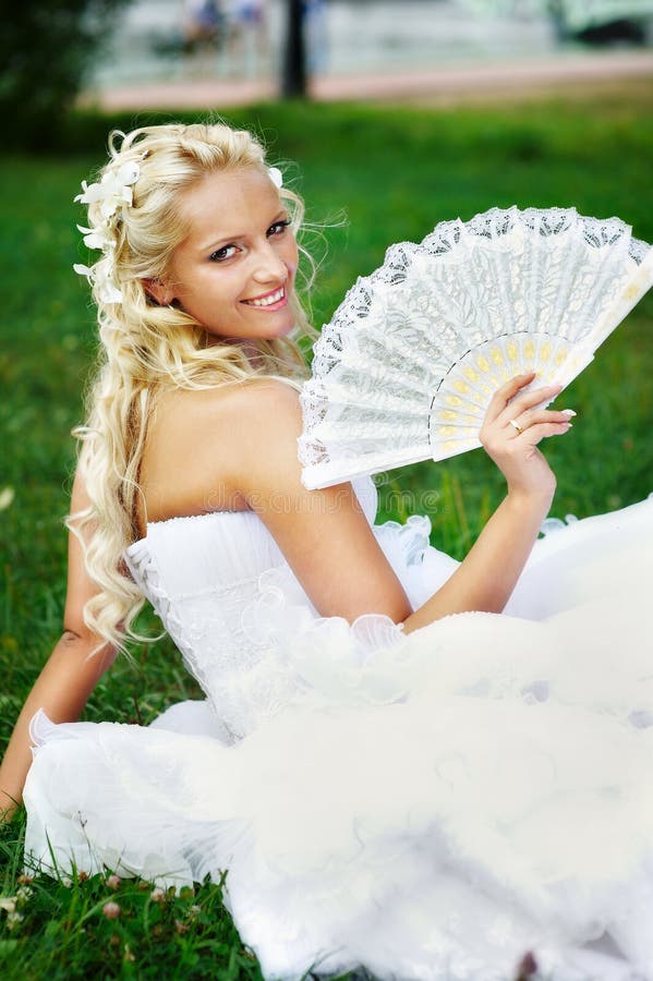 Happy Bride with Fan on Grass Stock Photo - Image of lace, meadow: 16226592