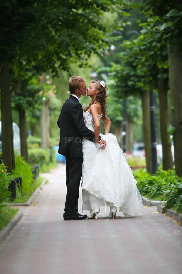 Happy bride and groom stock photo. Image of expression - 12527538