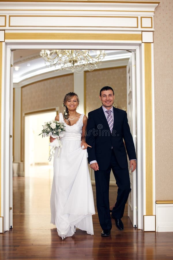 Happy bride and groom stock image. Image of hall, male - 23586497
