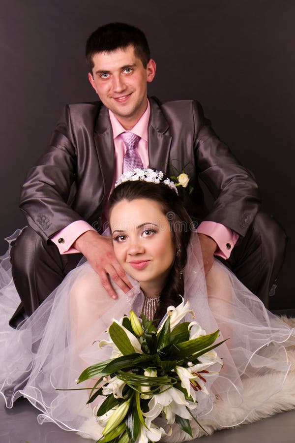 Happy bride and groom stock image. Image of newly, bouquet - 24826909