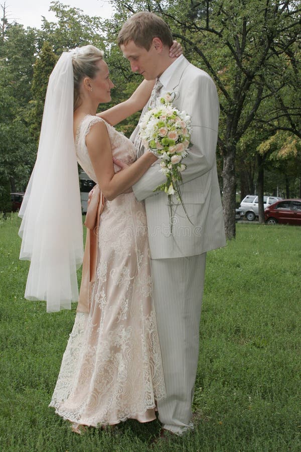 Happy bride with rose stock photo. Image of looking, indoors - 9182844