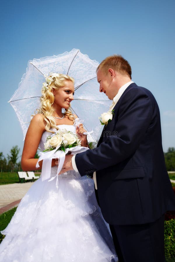 Happy Bride and Groom on Background Blue Sky Stock Image - Image of ...