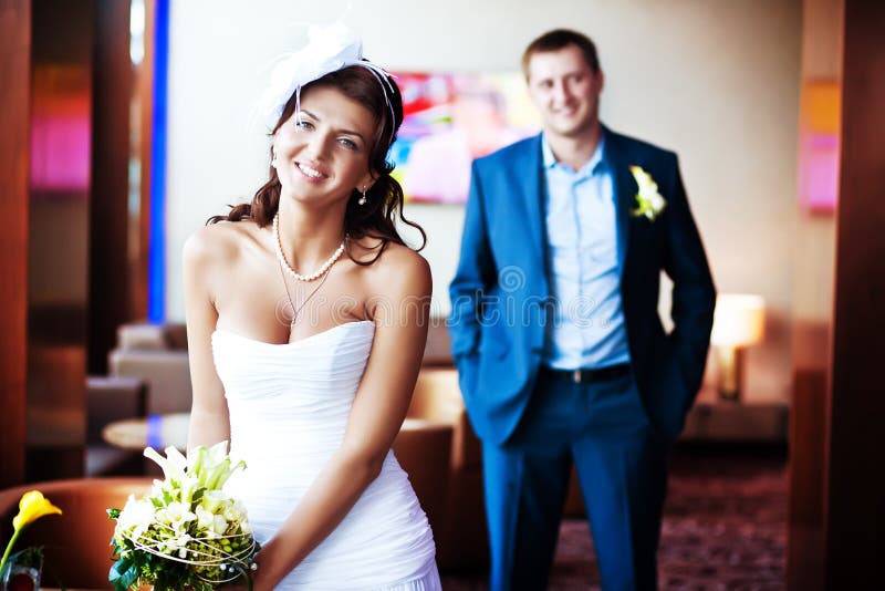 Happy Bride and Groom in a Bright Room Stock Image - Image of ...
