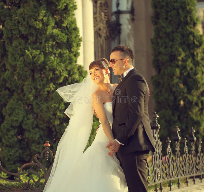 Happy bride and groom stock photo. Image of bushes, clothing - 39890242