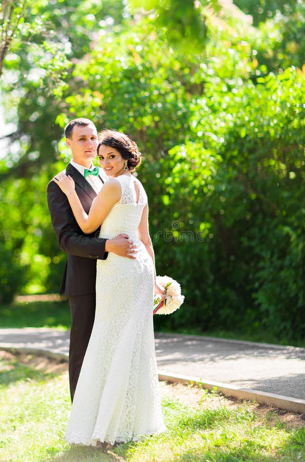 Happy Bride and Groom Outdoor Stock Photo - Image of happily, asian ...