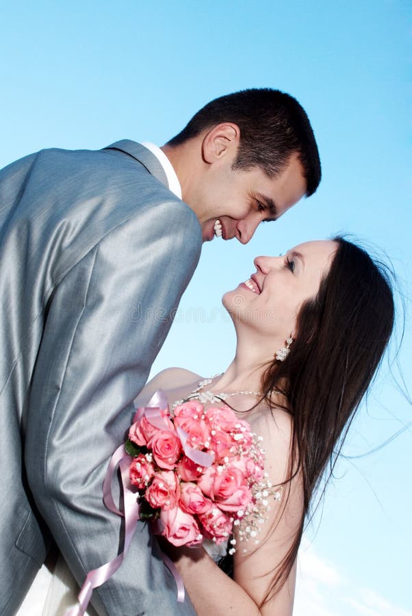 Happy Bride and Groom on Their Wedding Day Stock Photo - Image of rose ...