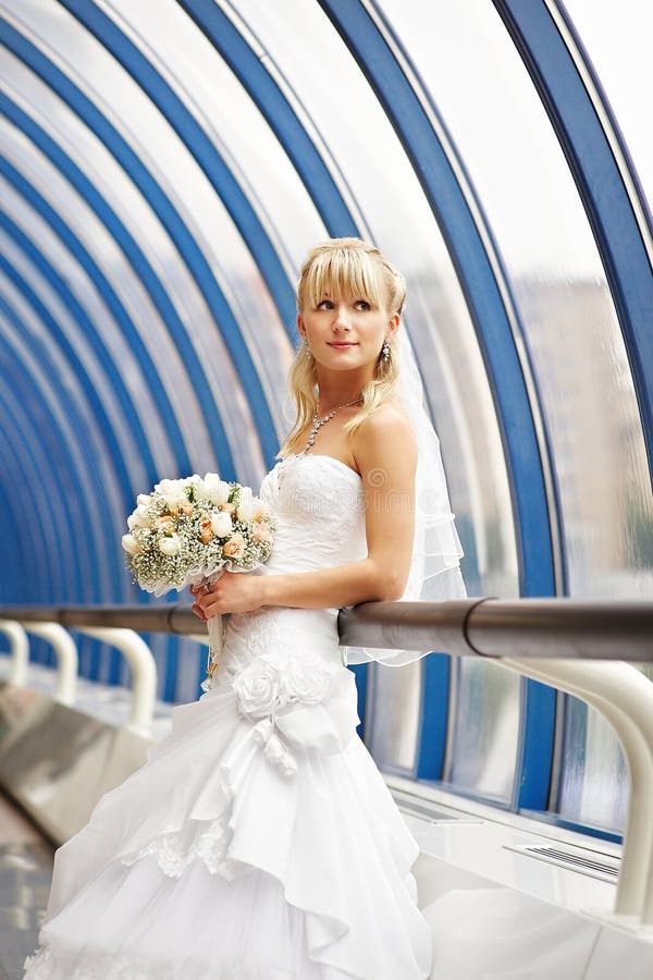 Happy Bride with Wedding Bouquet on Bridge Stock Photo - Image of glass ...