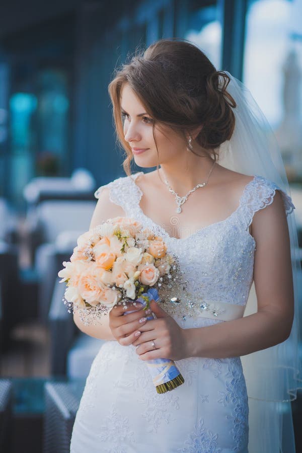 Happy Bride with a Wedding Bouquet Stock Photo - Image of view, plant ...