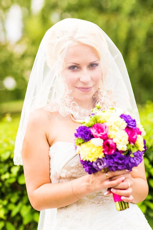 Happy Bride with Wedding Bouquet Stock Image - Image of beautiful ...