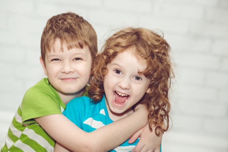 Happy Brother and Sister Smiling and Embracing. Stock Photo - Image of ...