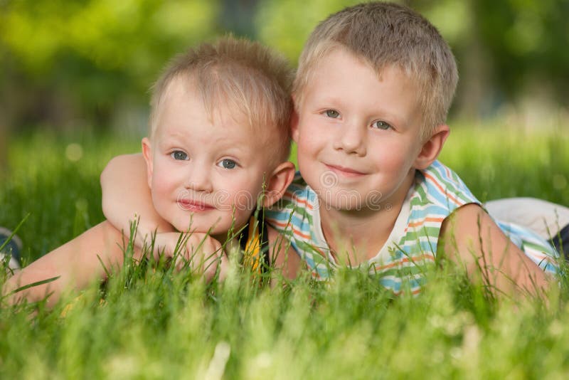 Happy Little Kids Smiling at the Park As they Peek Out the Window of a ...