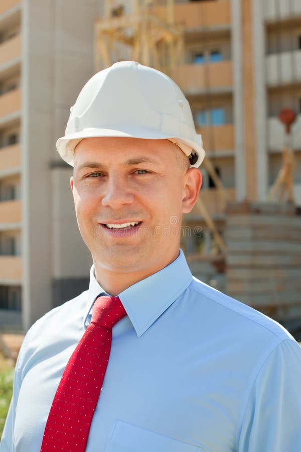 Happy builder in hardhat stock photo. Image of business - 27084284