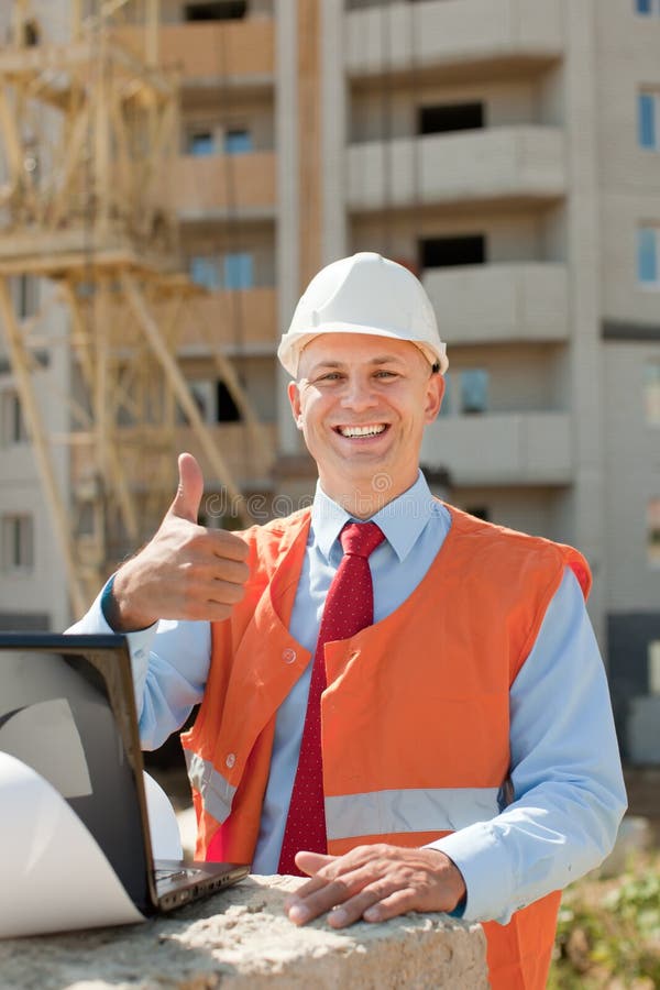 Happy builder in hardhat stock photo. Image of site, device - 28836946