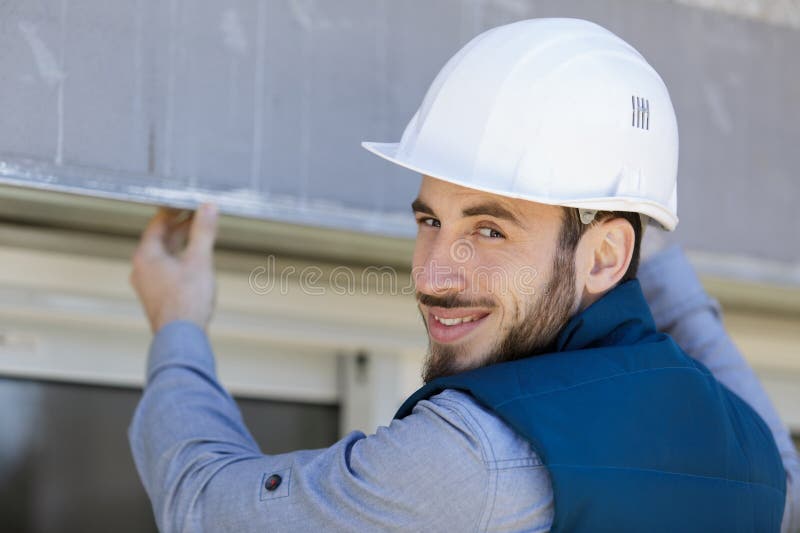 Happy Builder Smiling at Camera Stock Photo - Image of male, contractor ...