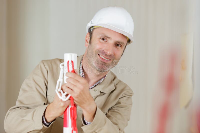 Happy builder at work stock image. Image of lightcoin - 258797023
