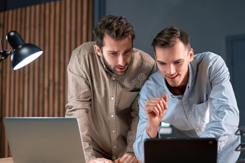 Happy Business Colleagues, Checking Out the Perfect Solution for Their ...