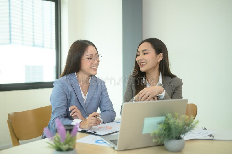 Happy Business Colleagues Working Together in a Modern Co Working Space ...